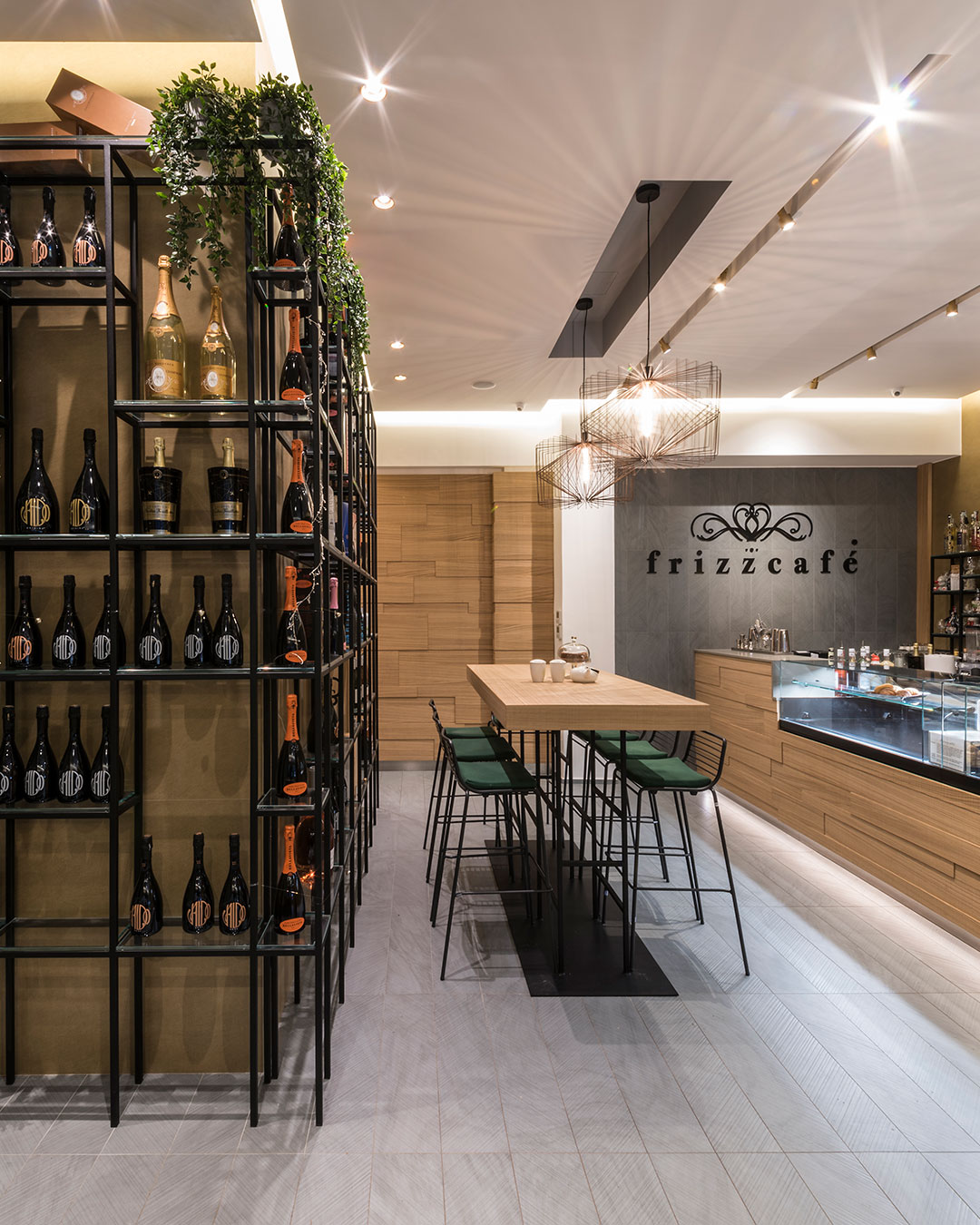 Frizzcafè, Bari: a place that combines materials and shapes in a ...